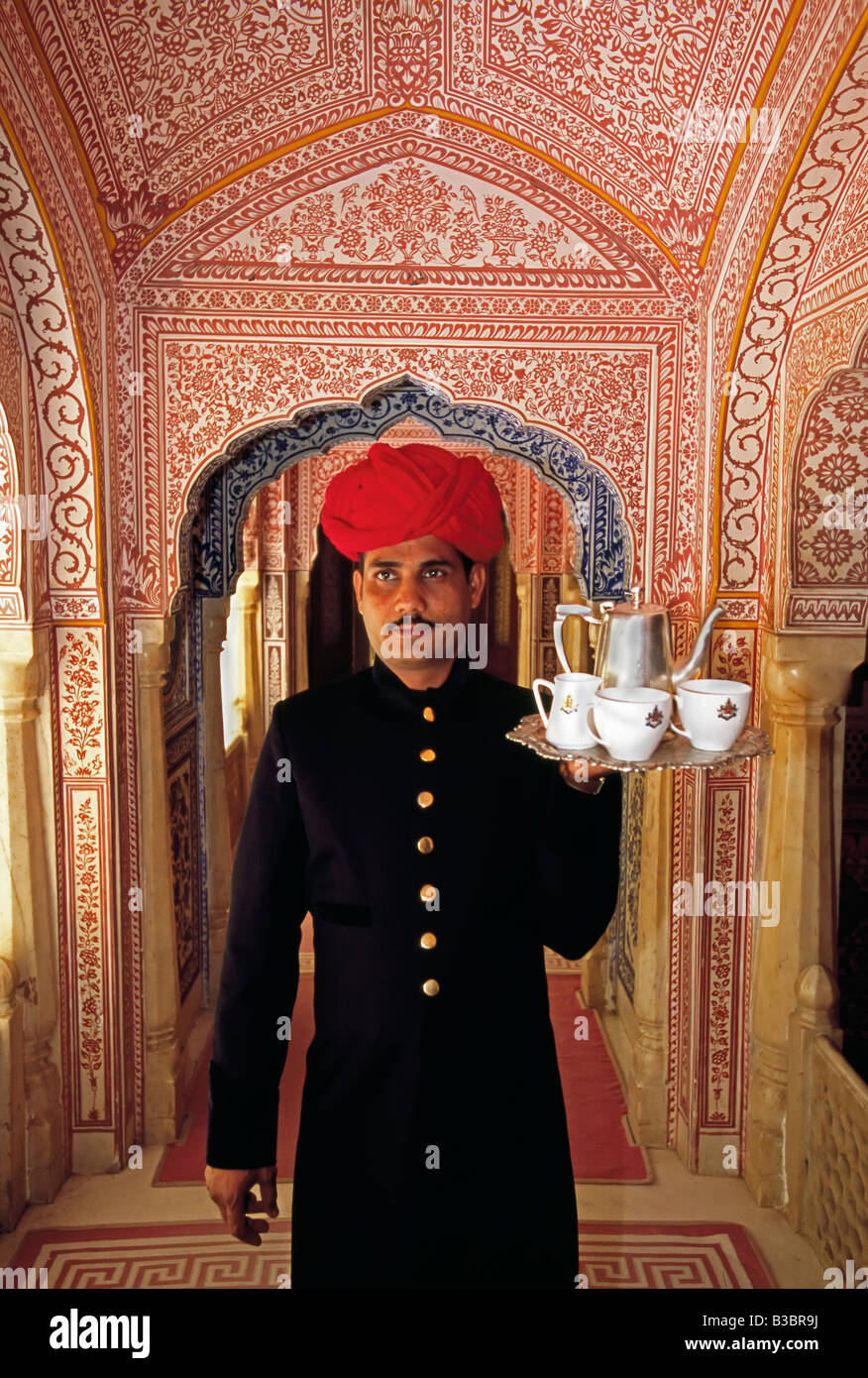 India, Rajasthan, Jaipur, Samode Palace, Waiter holding Tea Tray in ...