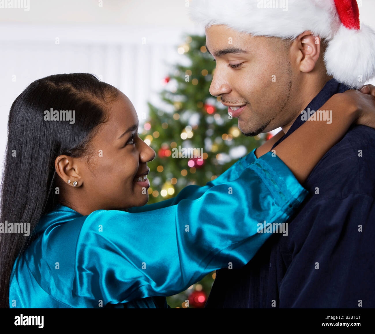 African couple hugging Stock Photo - Alamy