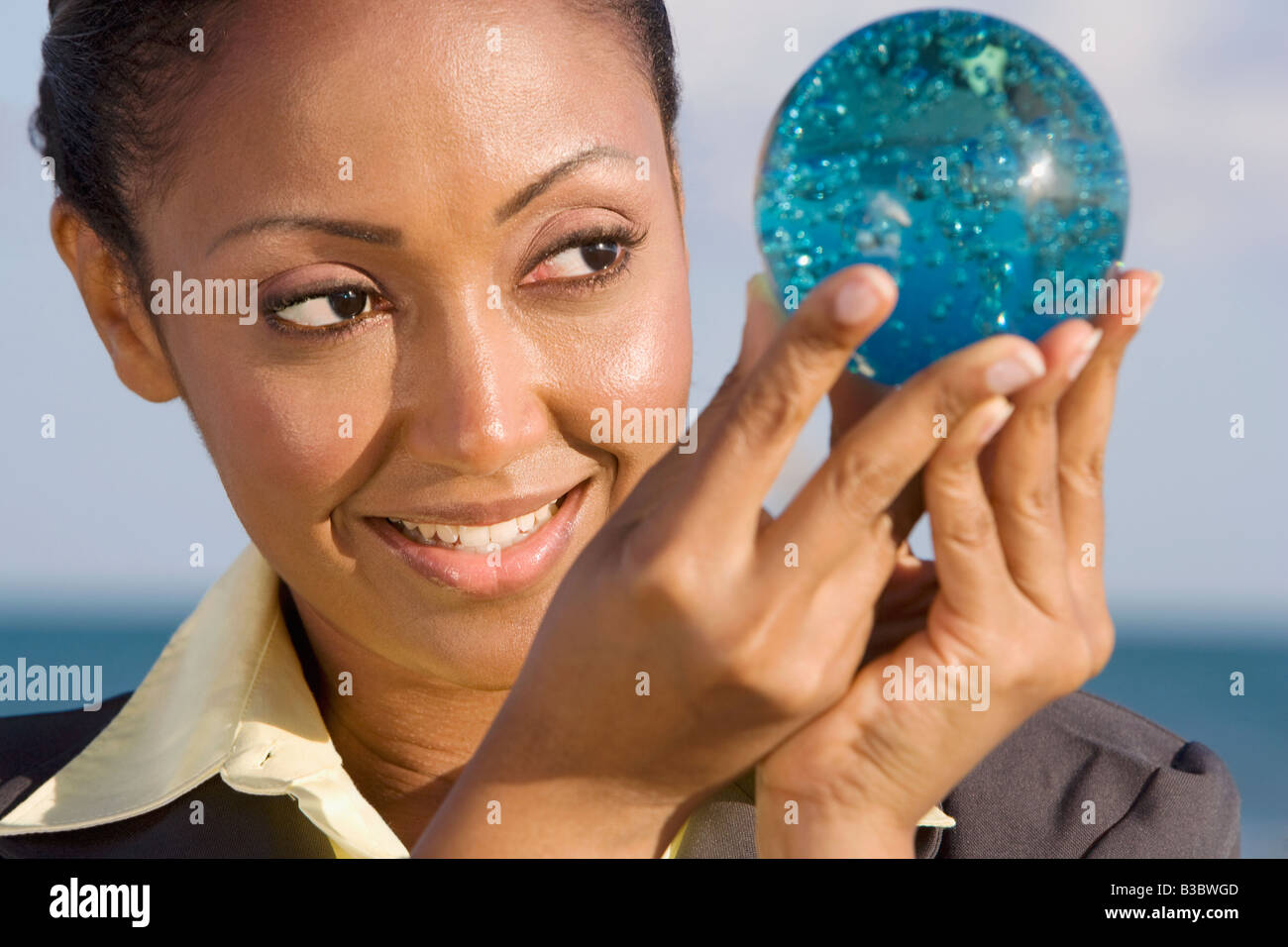 Woman holding orb hi-res stock photography and images - Alamy