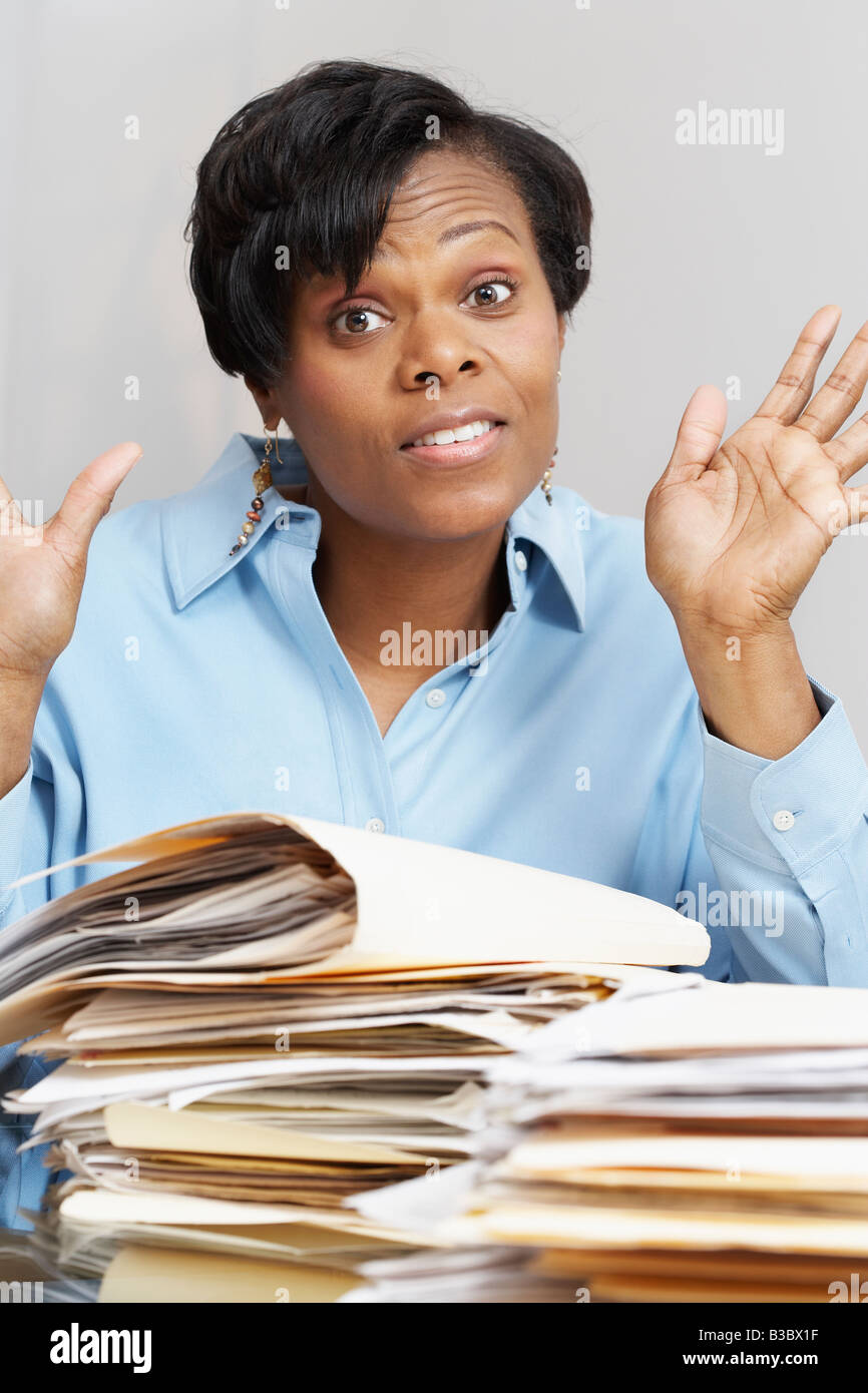 African businesswoman behind stacks of folders Stock Photo - Alamy African businesswoman behind stacks of folders Stock Photo - Alamy