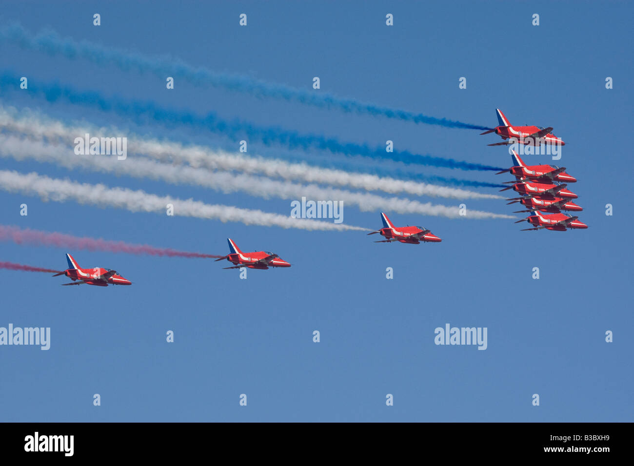 The Red Arrows flying display Stock Photo - Alamy