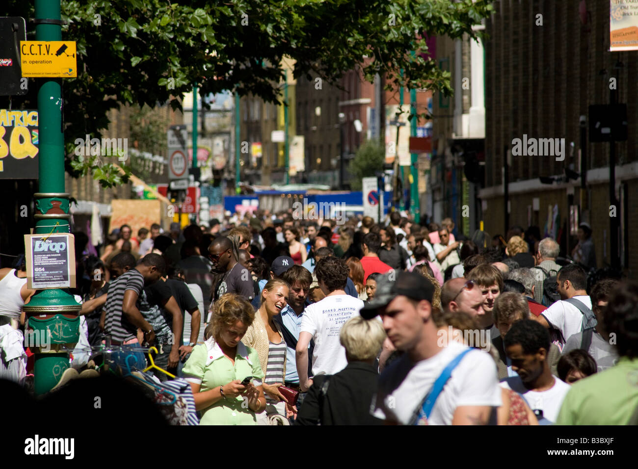 Crowd in Brick Lane Market. Shoreditch, Tower Hamlets, London, England ...