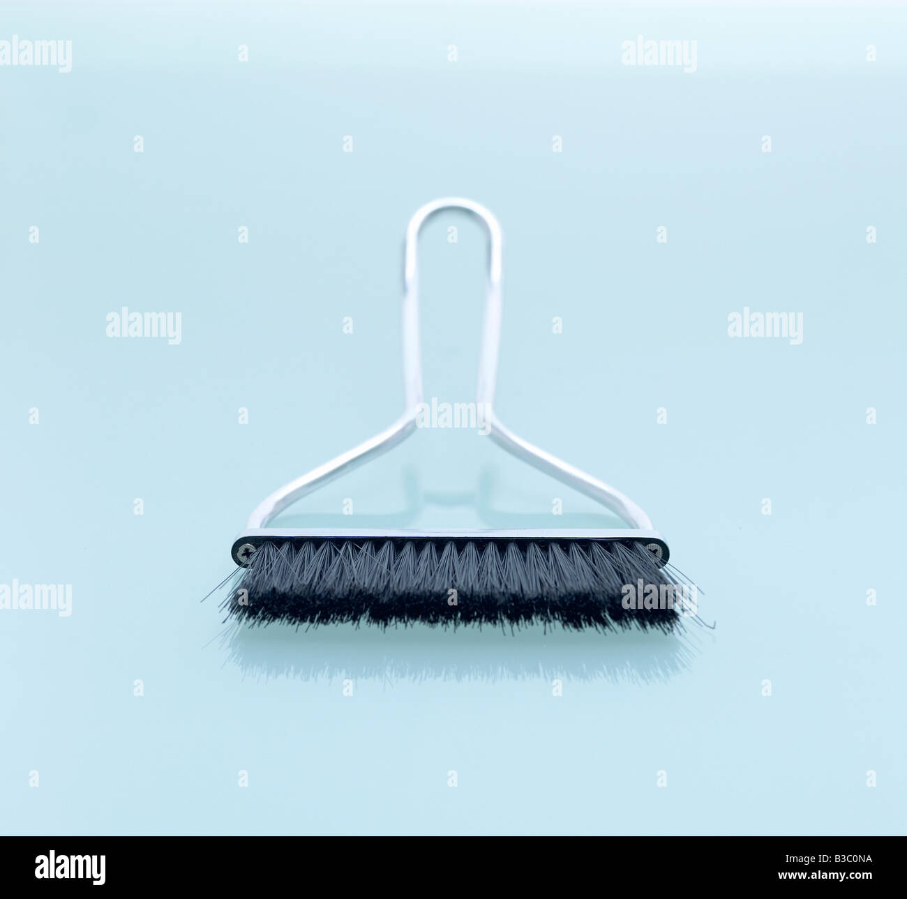 A brush with a metal handle Stock Photo - Alamy