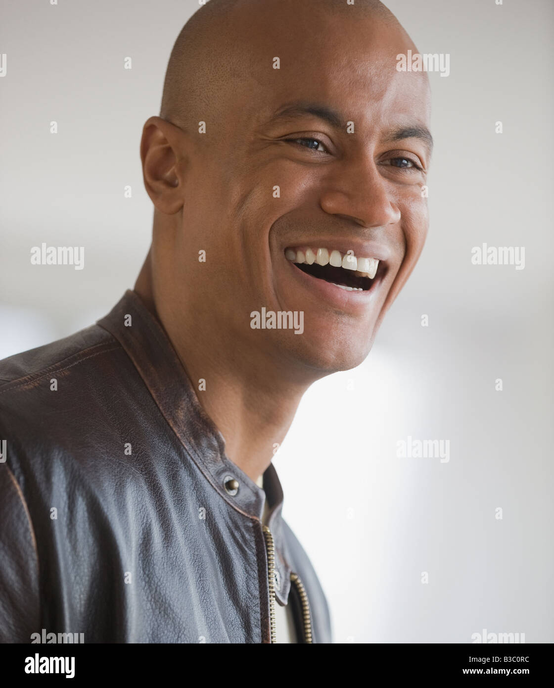 African man laughing Stock Photo - Alamy