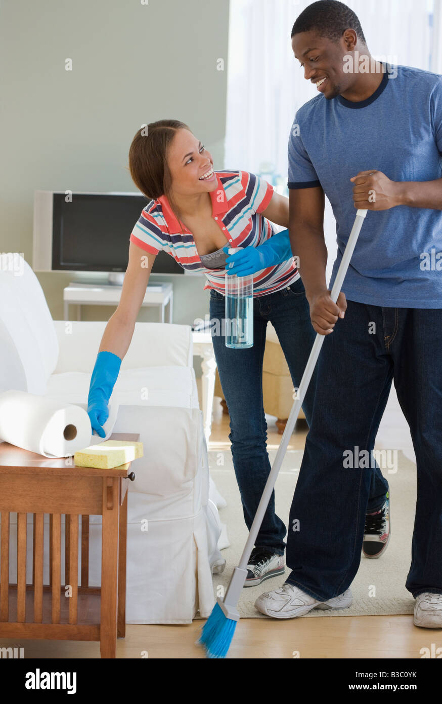 African woman sweeping hi-res stock photography and images - Alamy