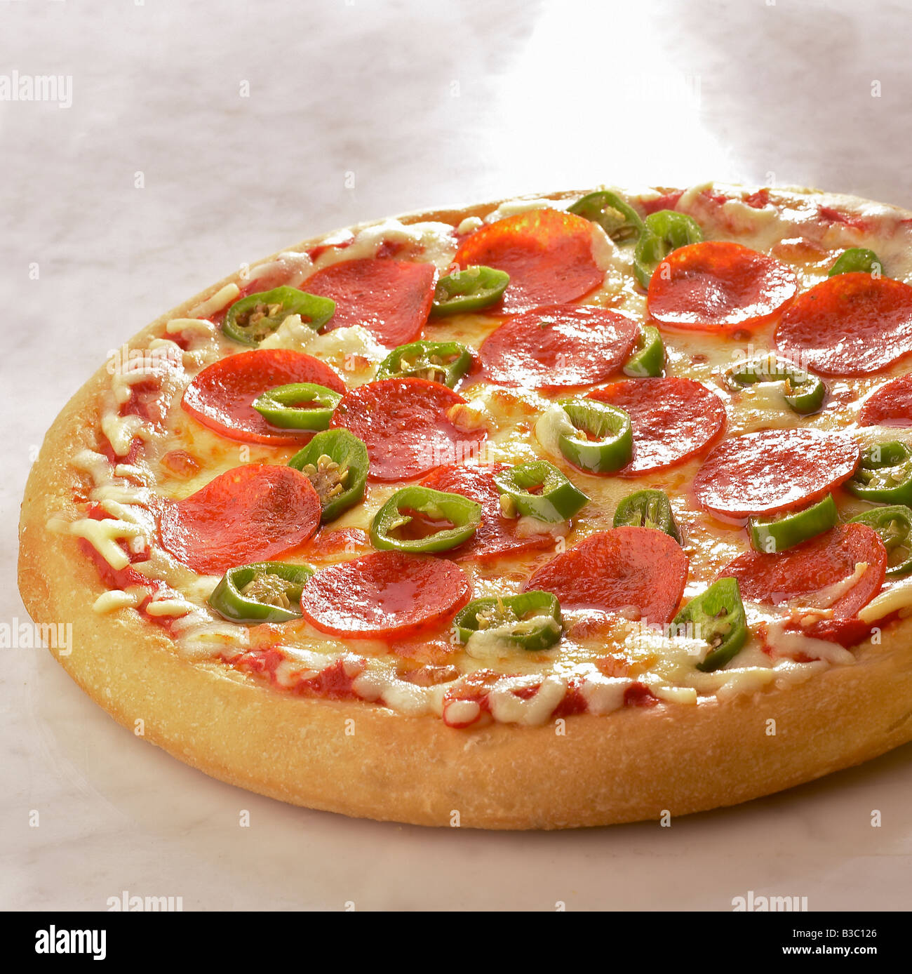 A pepperoni and pepper pizza Stock Photo - Alamy