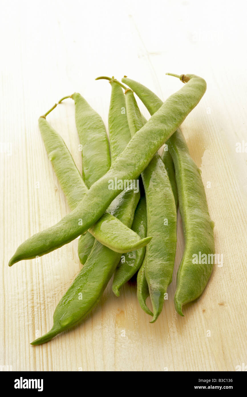 Runner beans on a plate Stock Photo - Alamy