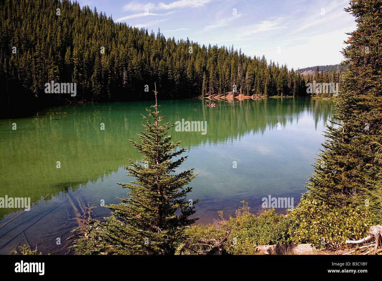 A canoe and a view of Devil s Lake along the Cascade Lakes Highway near ...