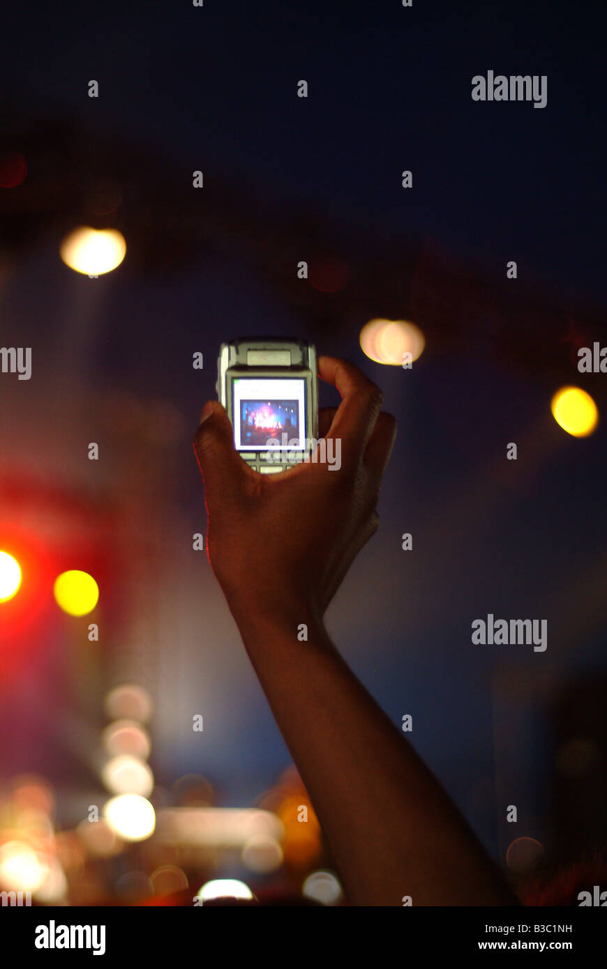Mobile phone lights crowd hi-res stock photography and images - Alamy