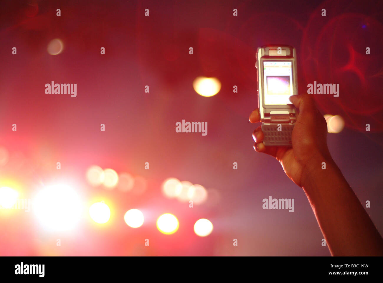 Mobile phone lights crowd hi-res stock photography and images - Alamy