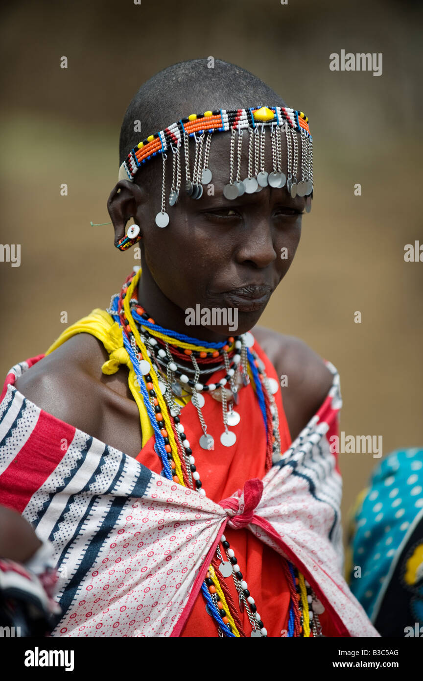 Kenya, Masai Mara National Reserve. Portrait of a Maasai woman in ...