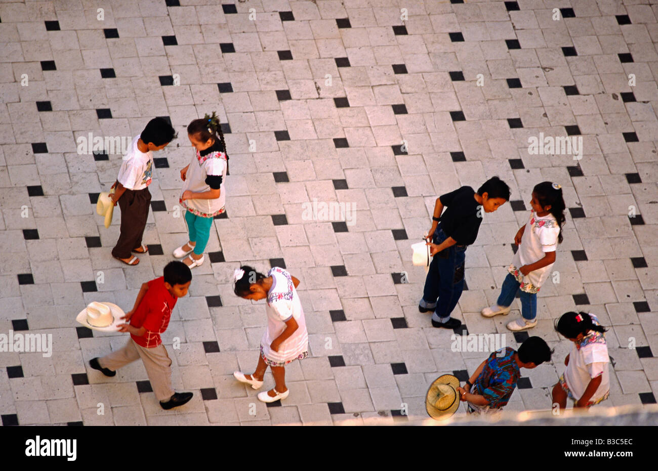 Mexico, State of Yucatan, Merida. Children practice a folklore dance in ...