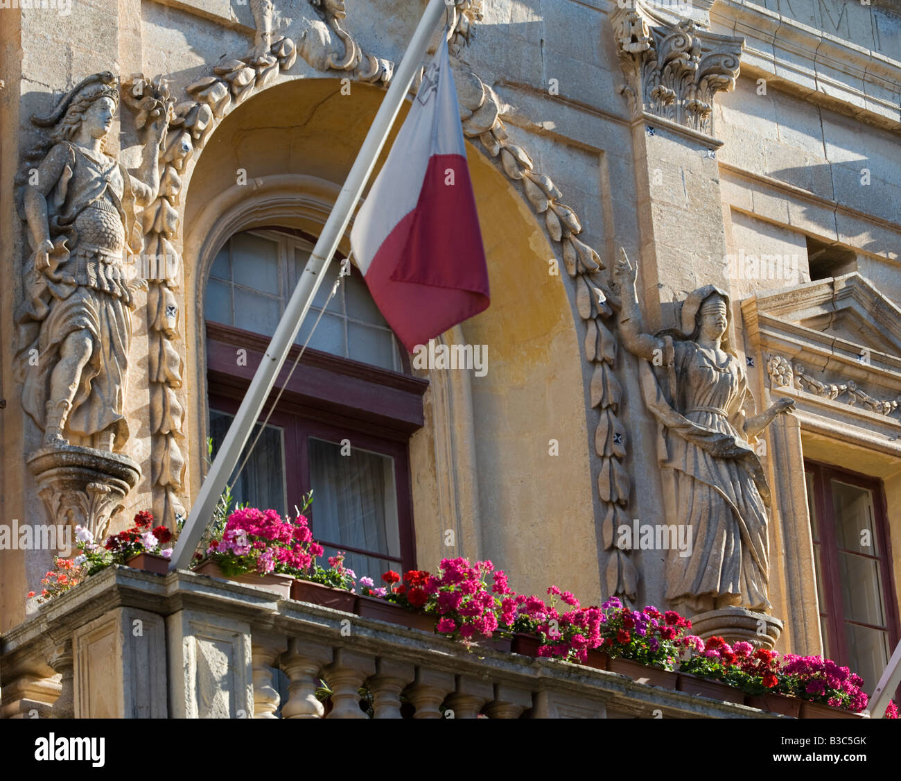Malta, Mdina. An ornate window and balcony on a government building in ...