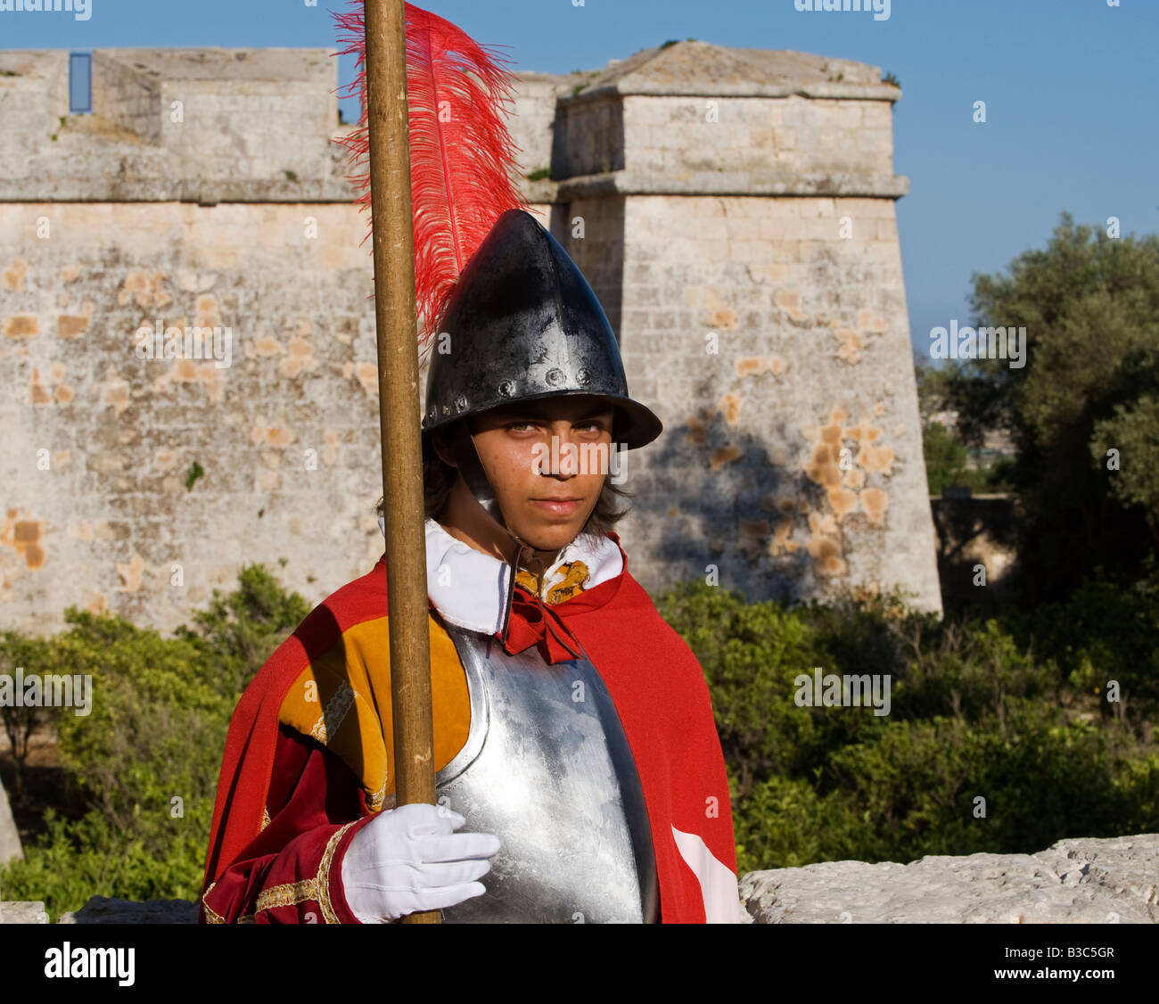 Malta, Mdina. A guard in the historic costume of a Templar knight ...