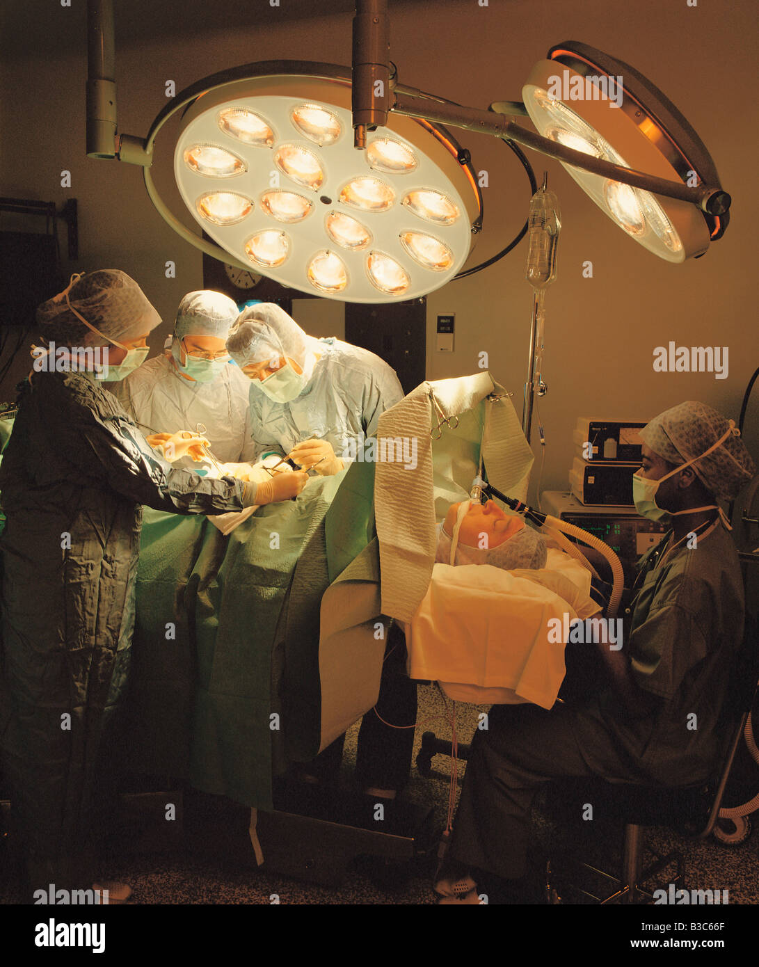 Hospital surgeons performing surgery Stock Photo - Alamy