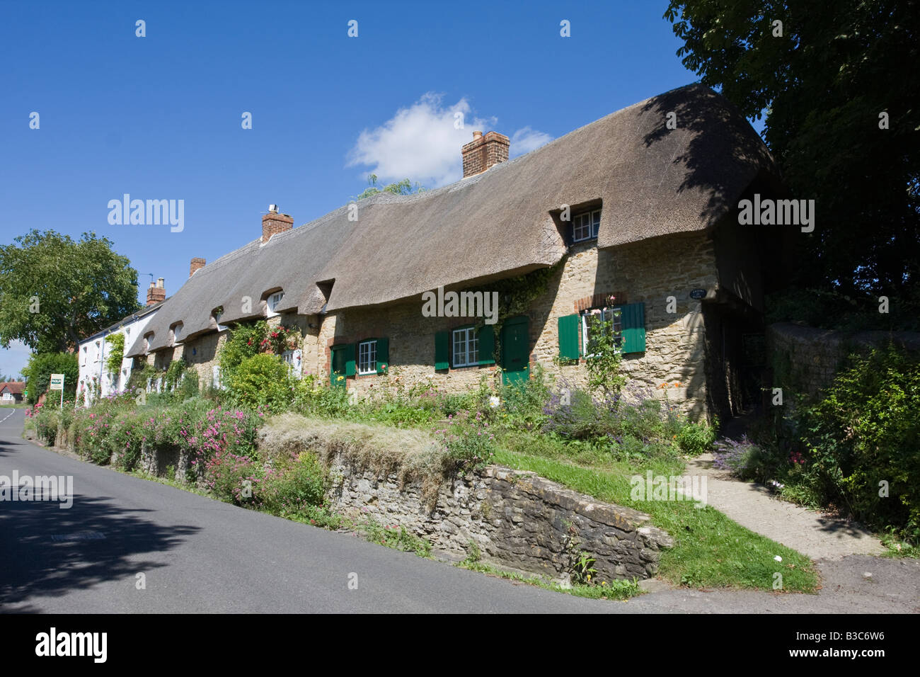 Thatched Cottages on Priory Bank Great Milton Oxfordshire Stock Photo ...