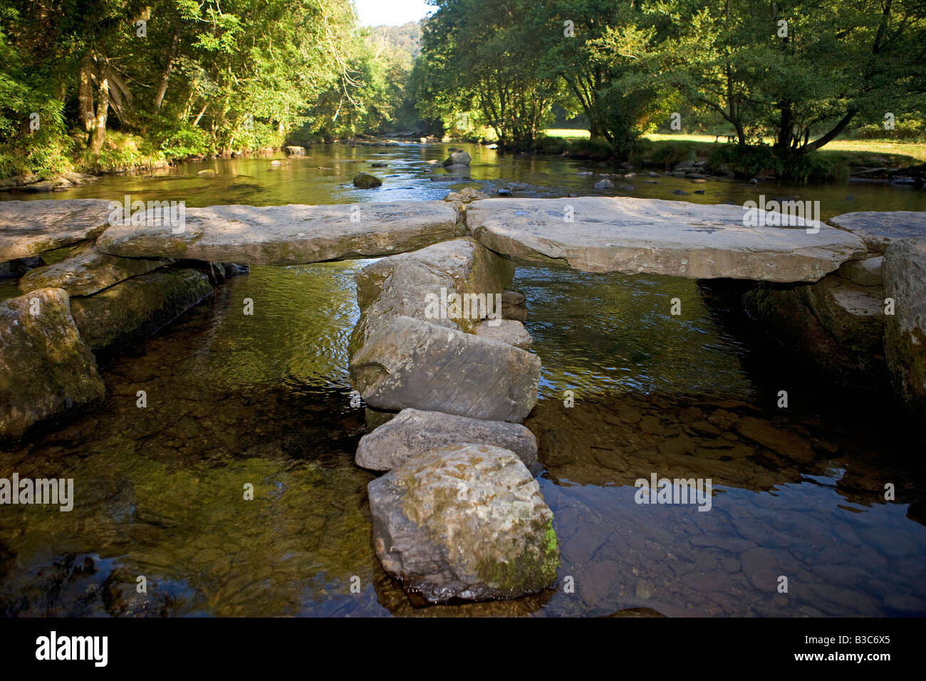 England, Somerset, Exmoor. Tarr Steps a prehistoric clapper bridge ...