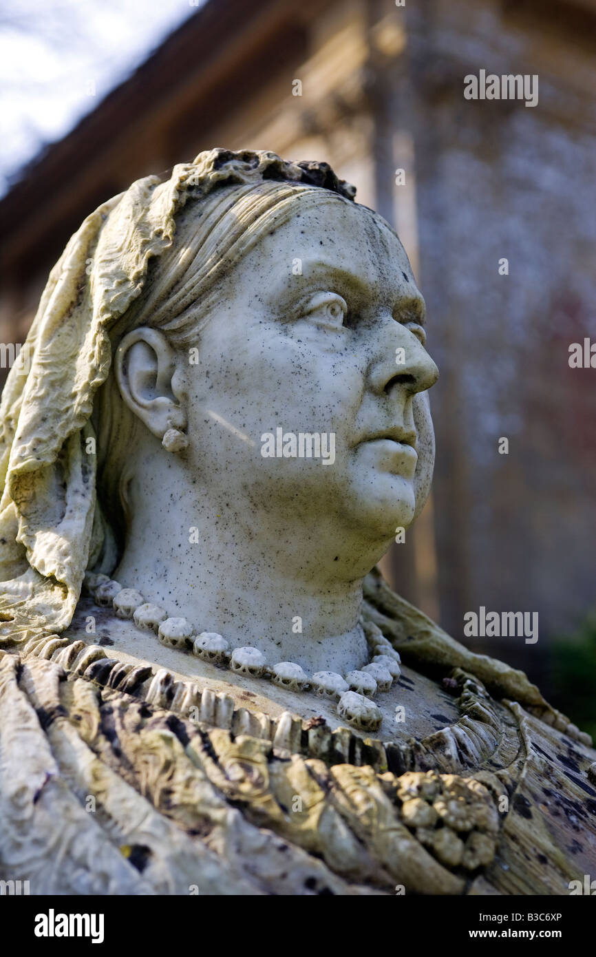 England, Dorset. Athelhampton House - stern faced Queen Victoria ...