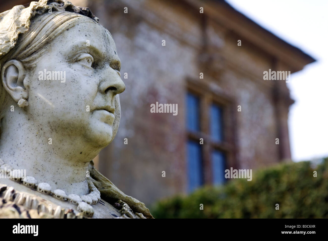 England, Dorset. Athelhampton House - stern faced Queen Victoria ...
