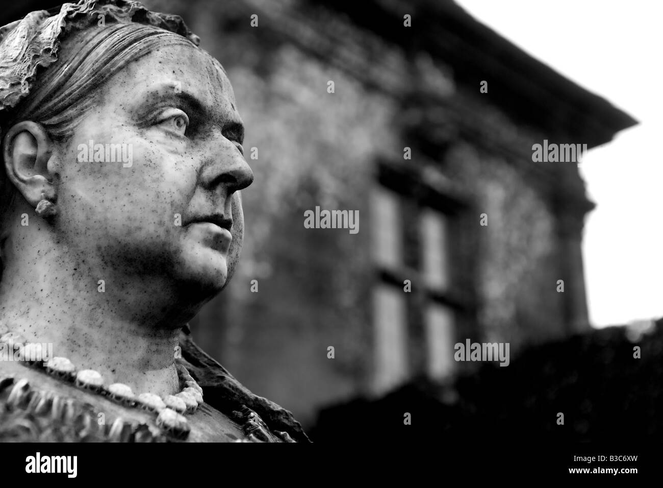 England, Dorset. Athelhampton House - stern faced Queen Victoria ...