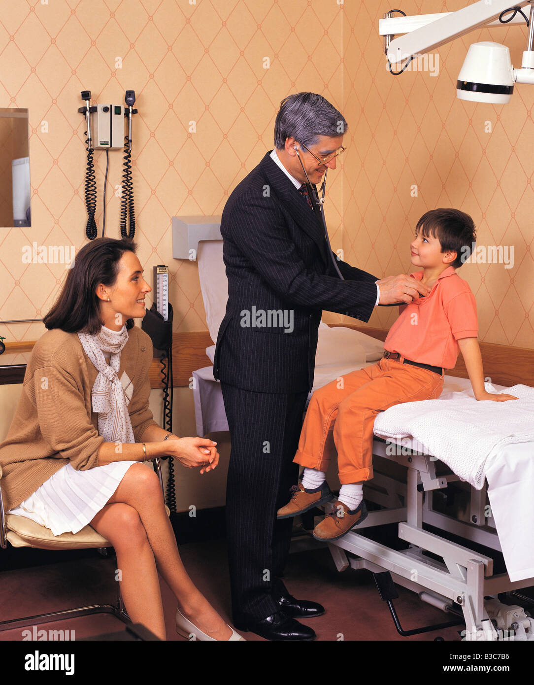 Child having medical checkup by a doctor in hospital Stock Photo - Alamy