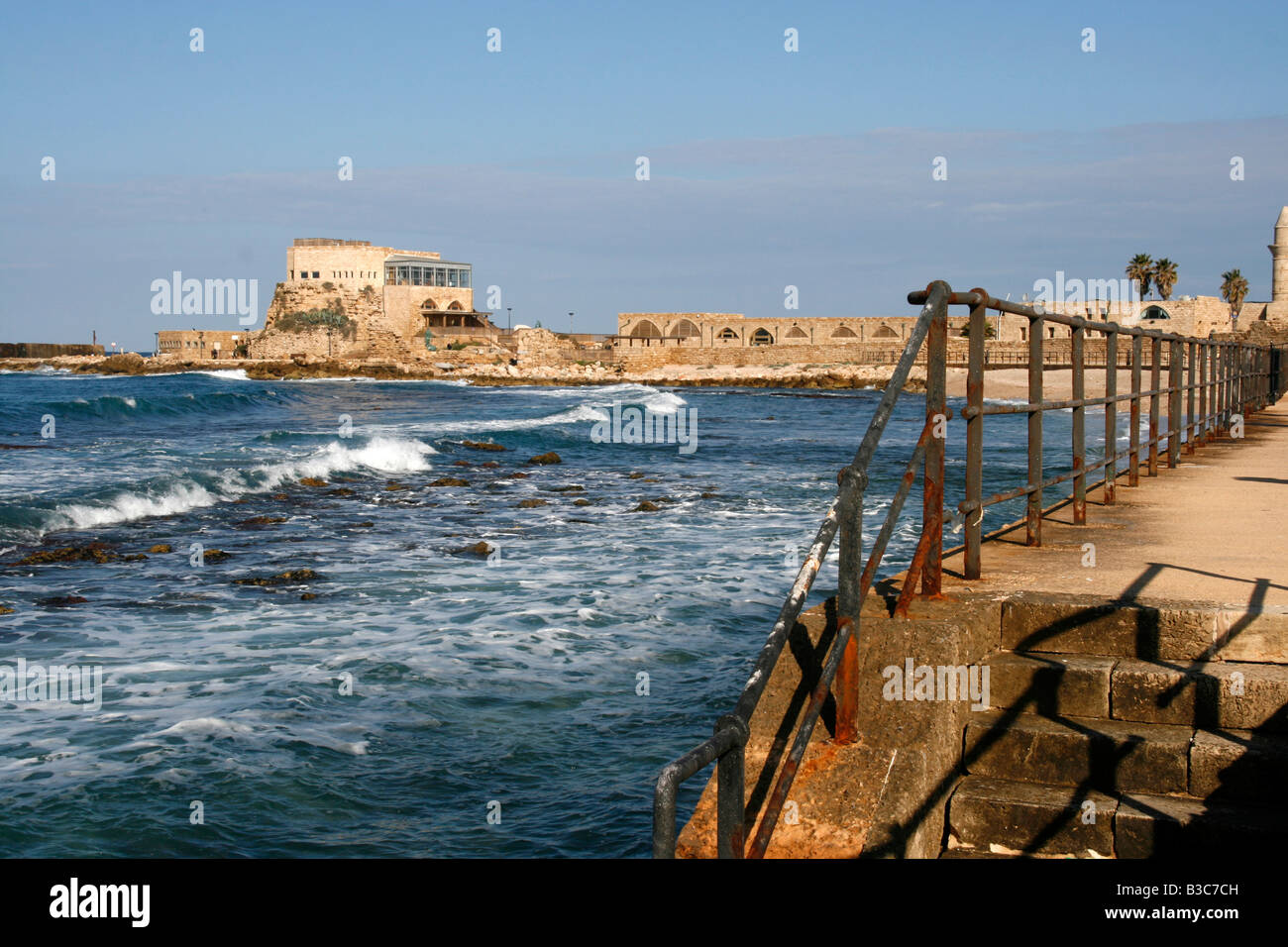Israel, Caesarea. The coastline and promenade of Caesarea. Caesarea is ...