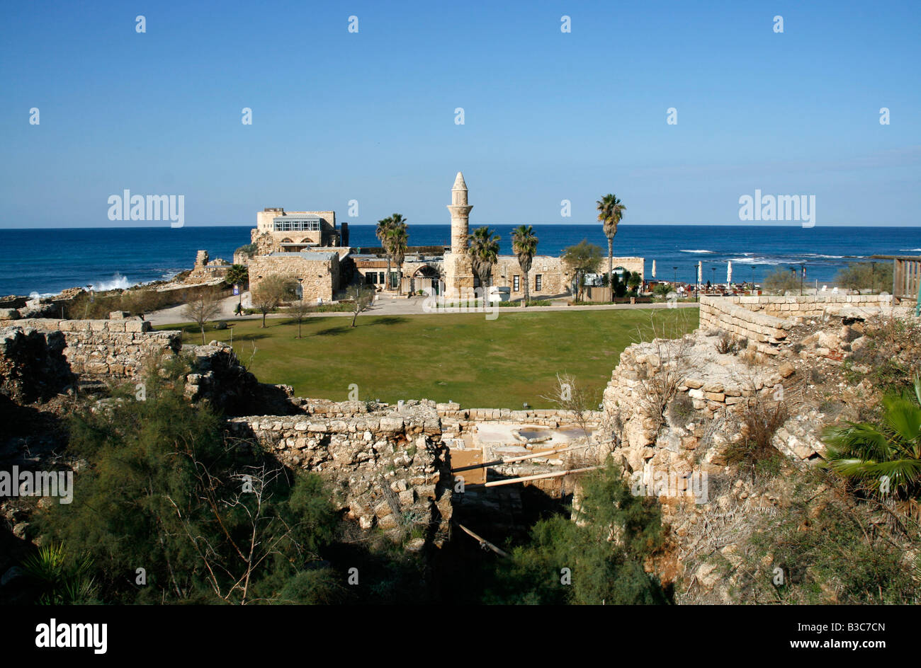 Israel, Caesarea. The fortress and minaret at Caesarea. Caesarea is a ...