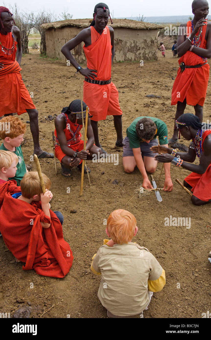 Kenya, Masai Mara National Reserve. During a visit to a Maasai manyatta ...
