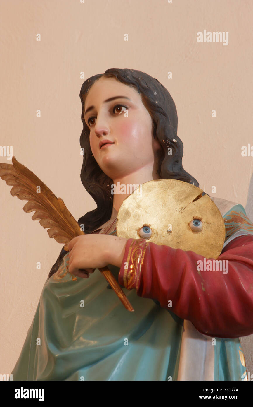 Statue of Santa Lucia (saint Lucy), patron saint of eyes, in church on ...