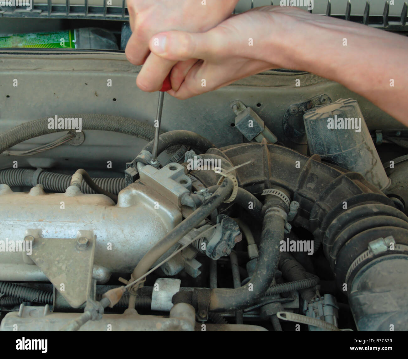mechanic working on an engine Stock Photo - Alamy