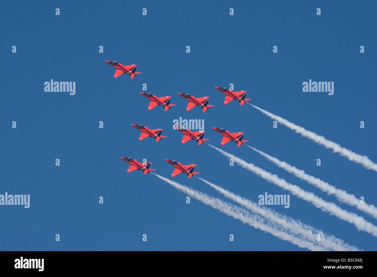 The Red Arrows flying display Stock Photo - Alamy