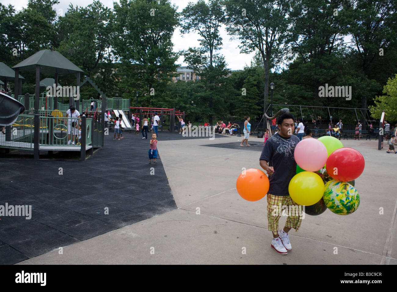 Man carrying balloons hi-res stock photography and images - Alamy