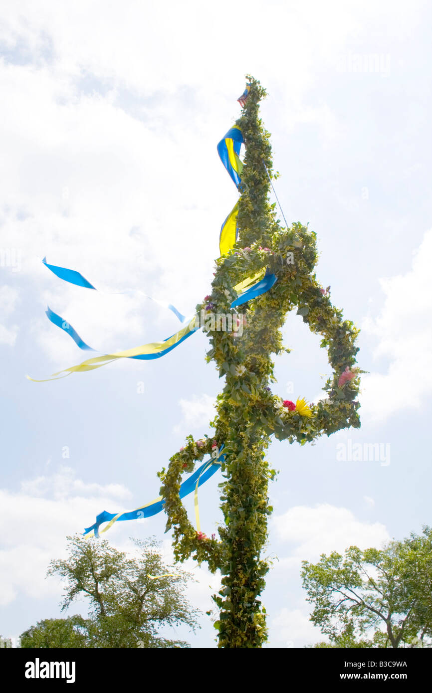 Midsommar Pole with yellow and blue ribbons. Svenskarnas Dag Swedish ...