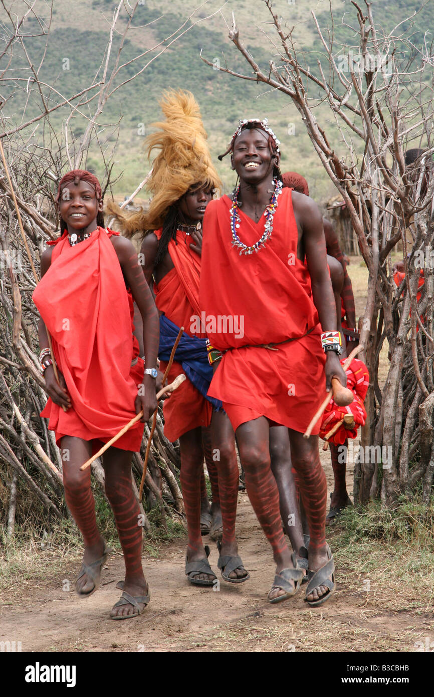 Decorated Masai men dancing in traditional costume Stock Photo - Alamy