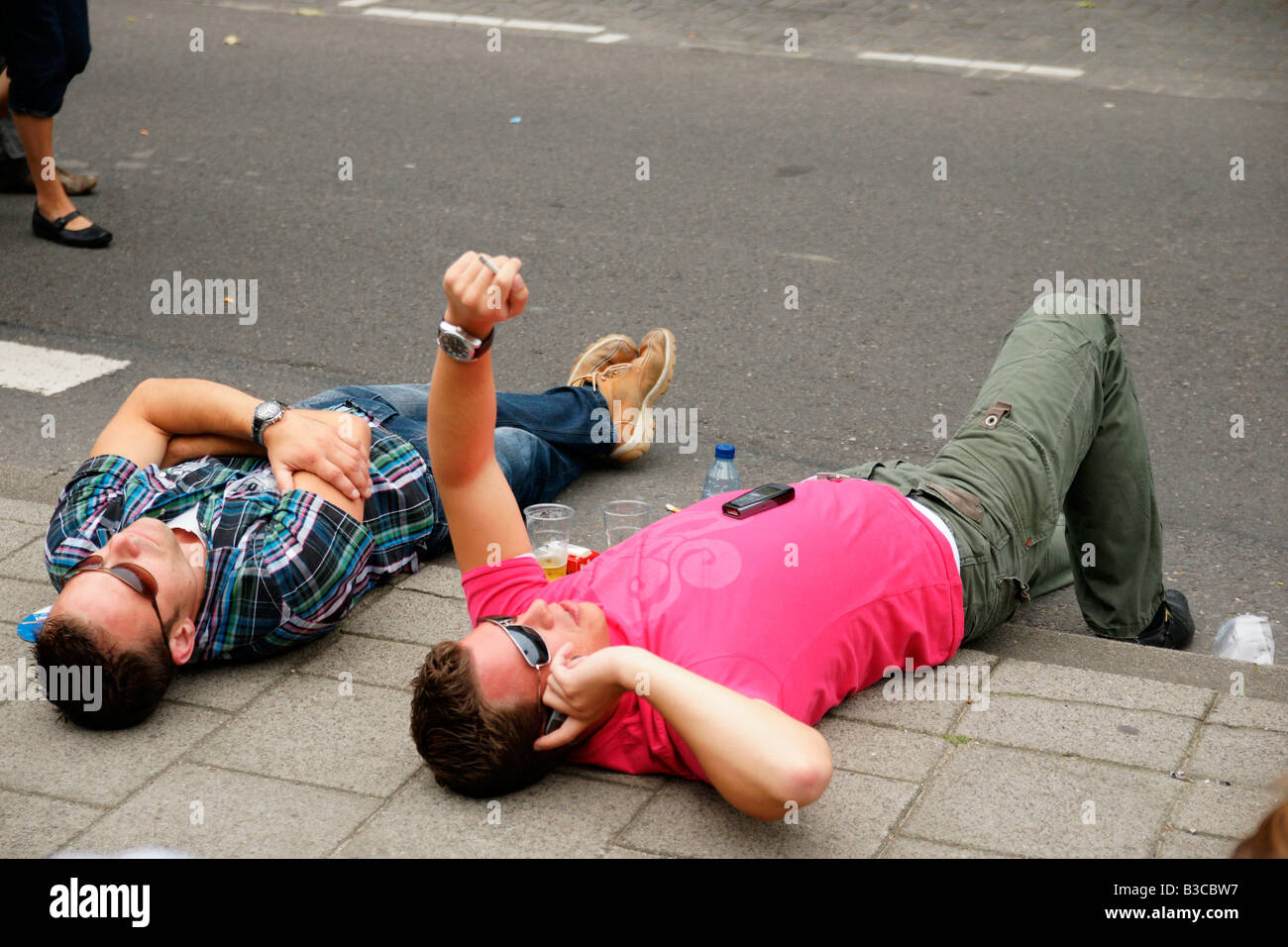 Lying down on road hi-res stock photography and images - Alamy