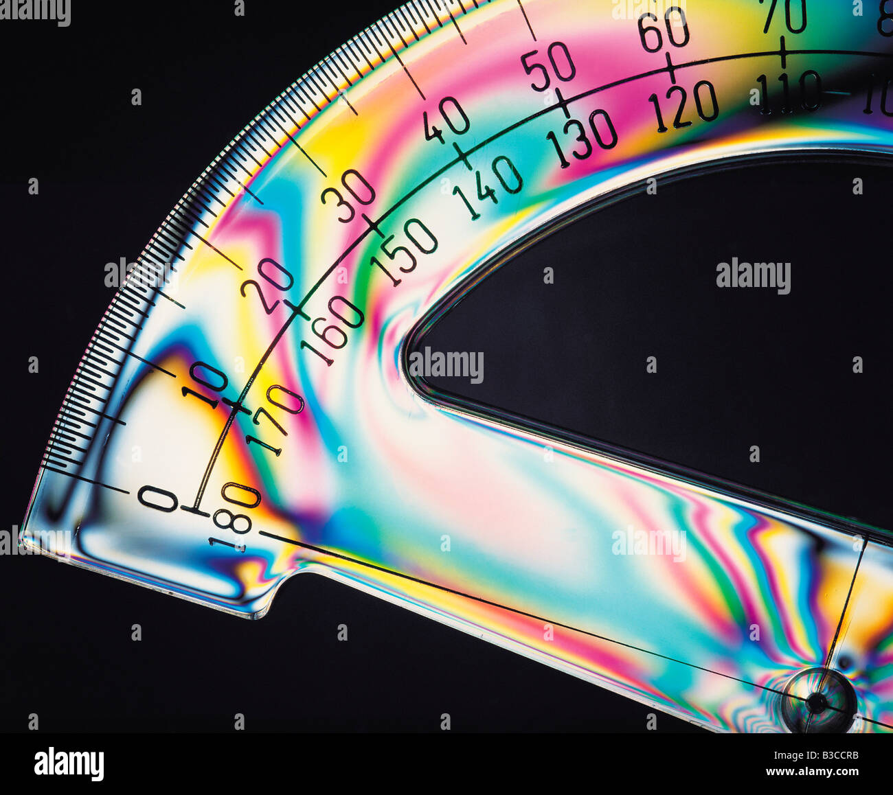 Stress pattern on a plastic protractor Stock Photo - Alamy