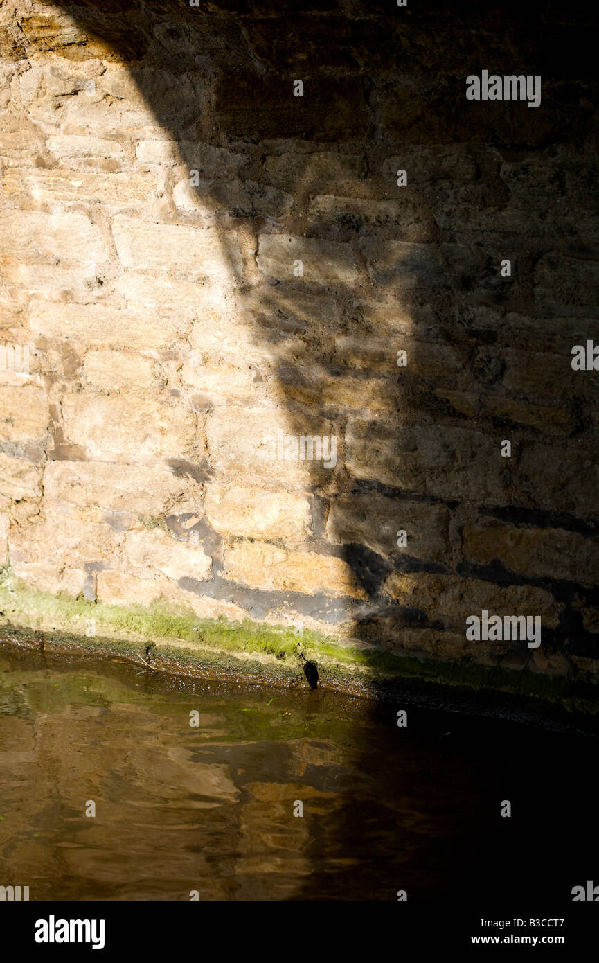 Underneath a canal bridge Stock Photo - Alamy