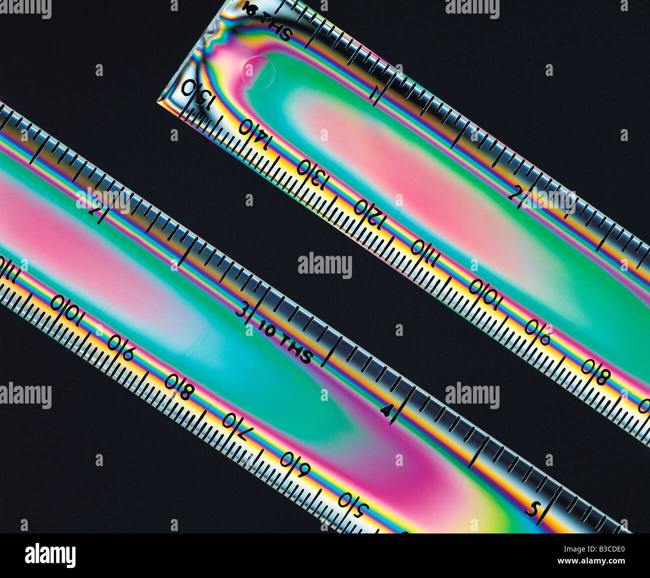 Plastic rulers photographed in polarized light showing stress patterns ...