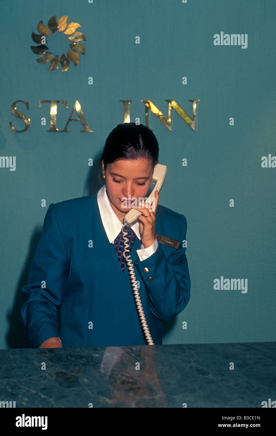 Front desk clerk hi-res stock photography and images - Alamy