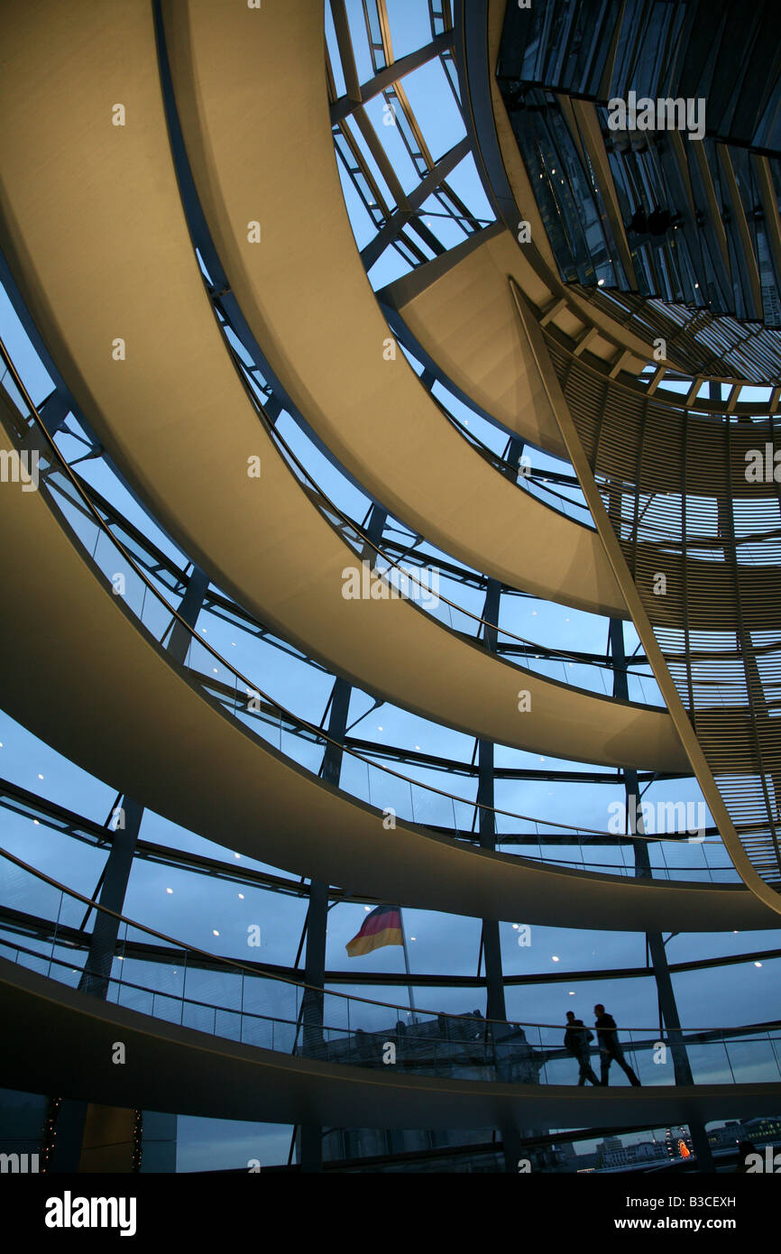 Tourists inside the dome of the Reichstag building in Berlin, Germany ...