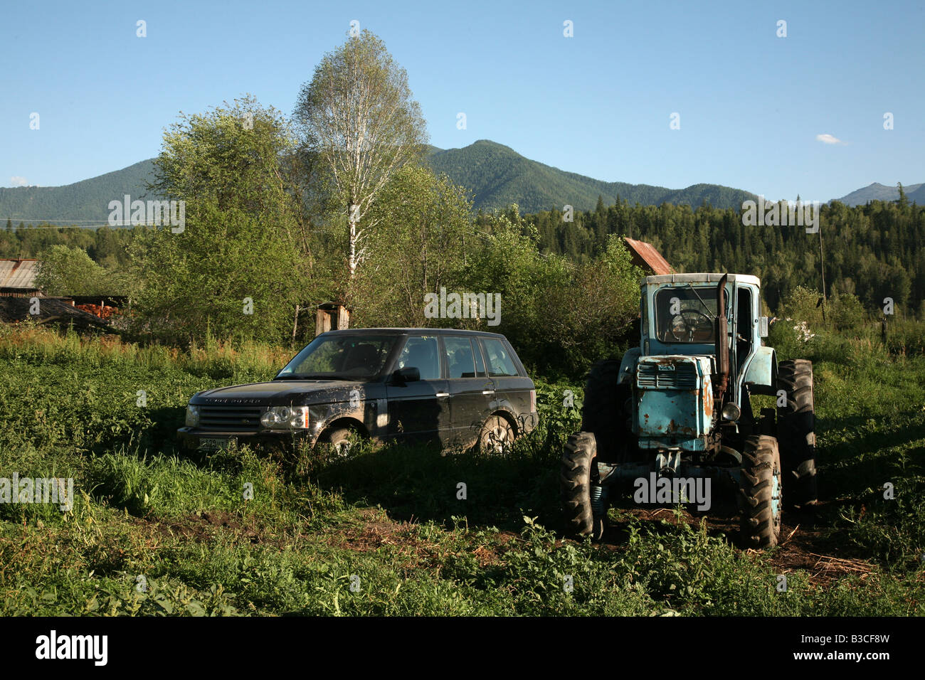 Tractor and Range Rover car parked in the private kitchen garden in ...