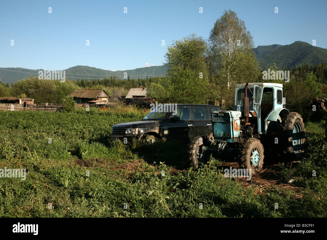 Tractor and Range Rover car parked in the private kitchen garden in ...