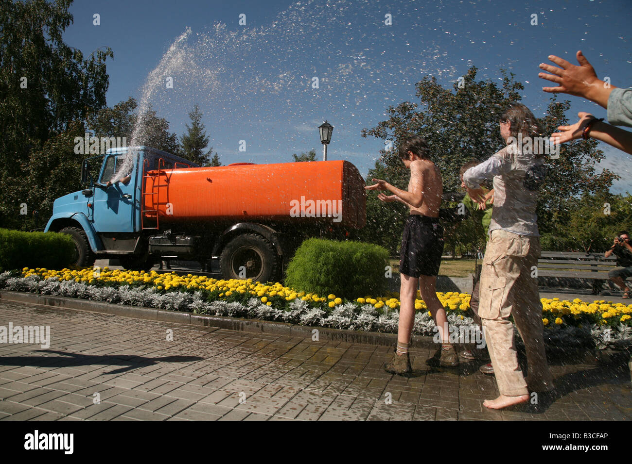 Car splash person child hi-res stock photography and images - Alamy