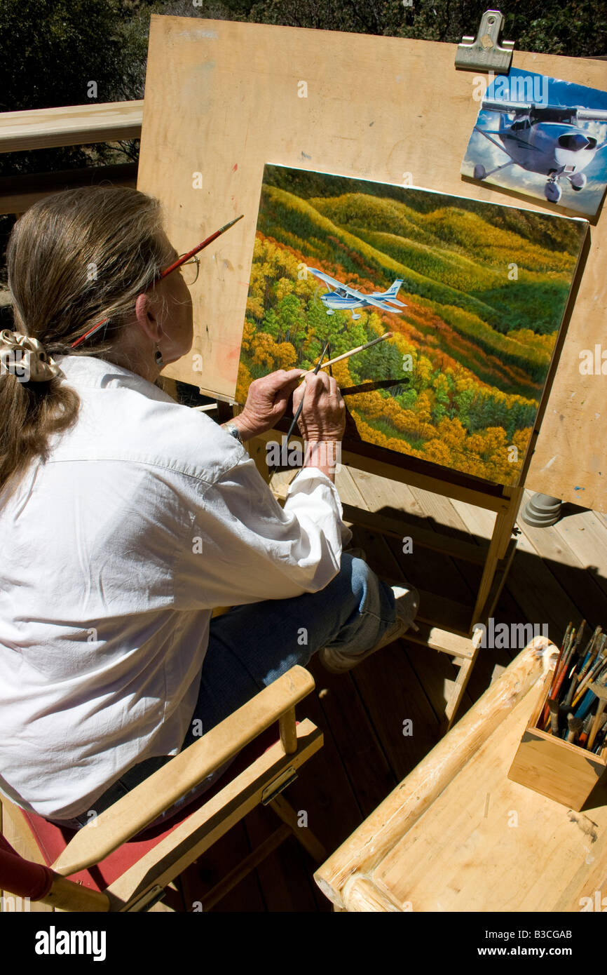 Painter works on her newest painting Stock Photo - Alamy