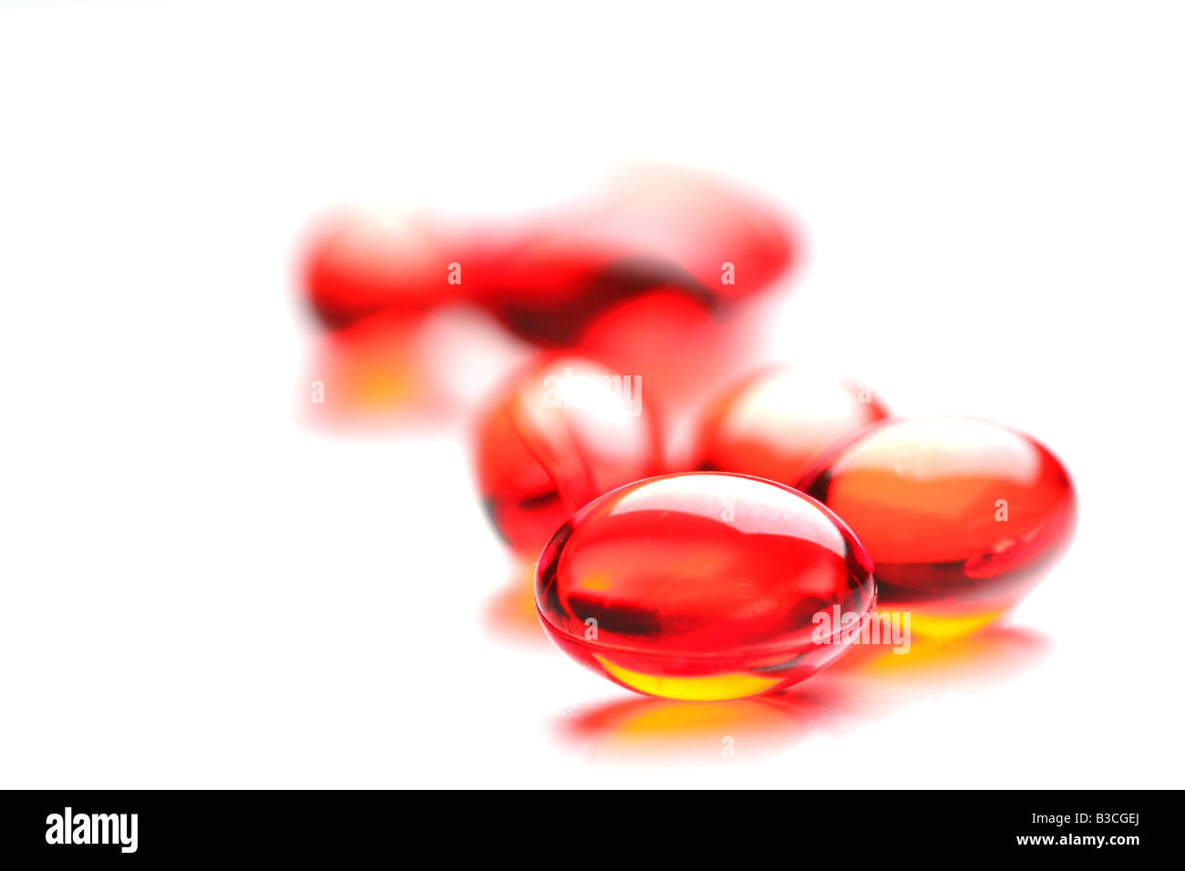Red Capsules with Medicament closeup Stock Photo - Alamy