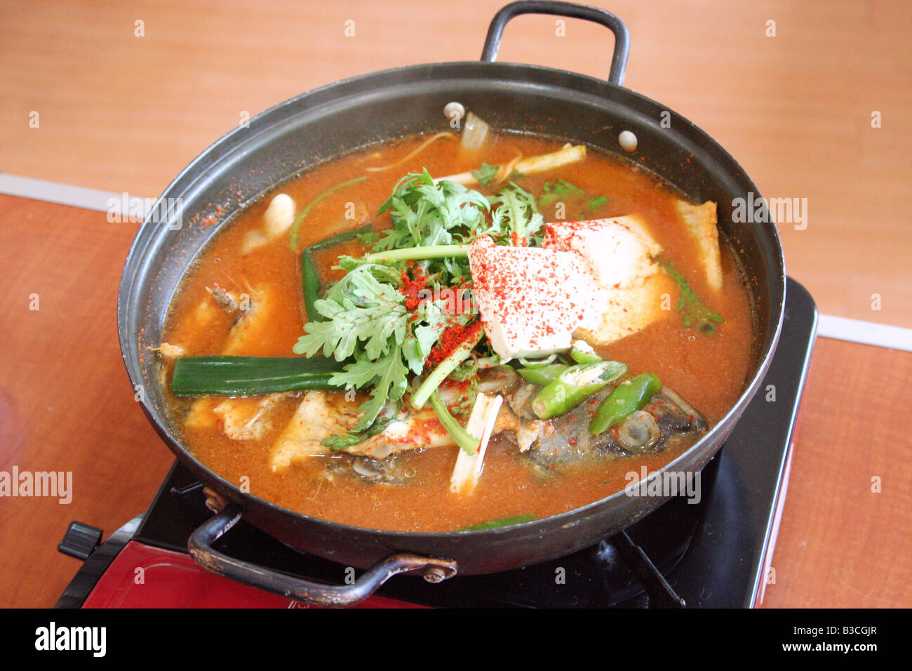 Traditional Korean fish soup with vegetables and tofu. Usually served ...