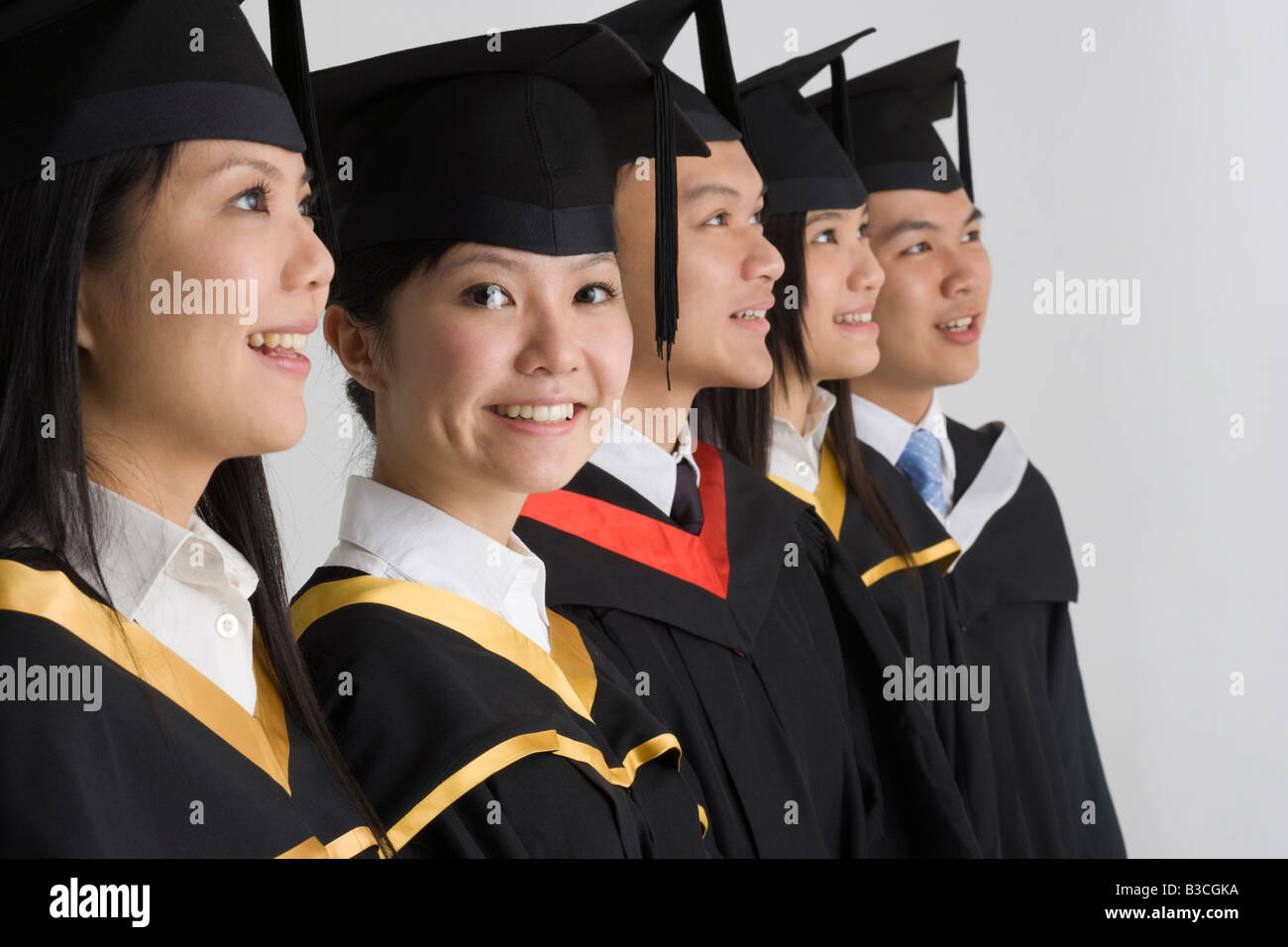 Five young graduate students smiling together Stock Photo - Alamy