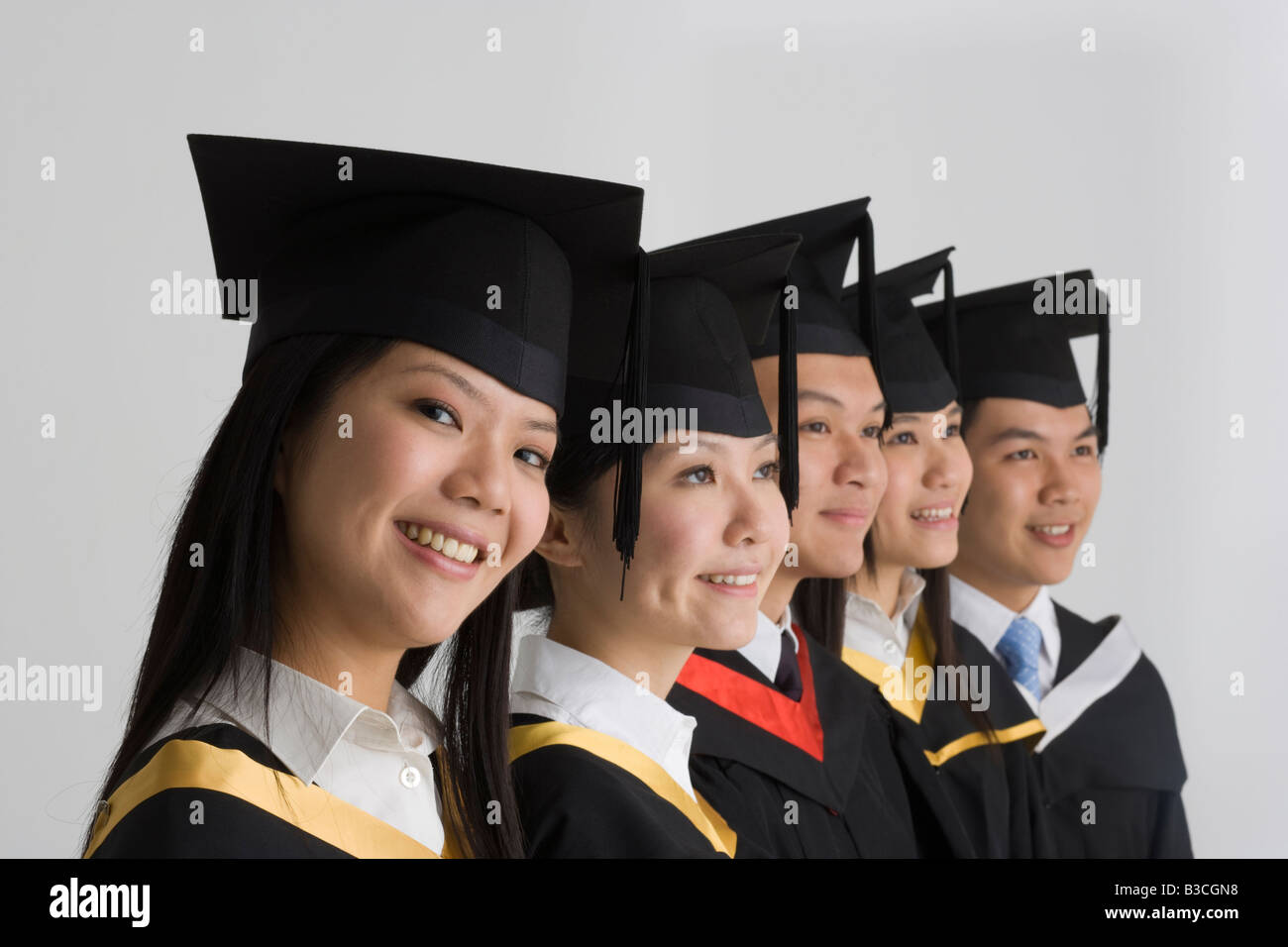 Five young graduate students smiling together Stock Photo - Alamy