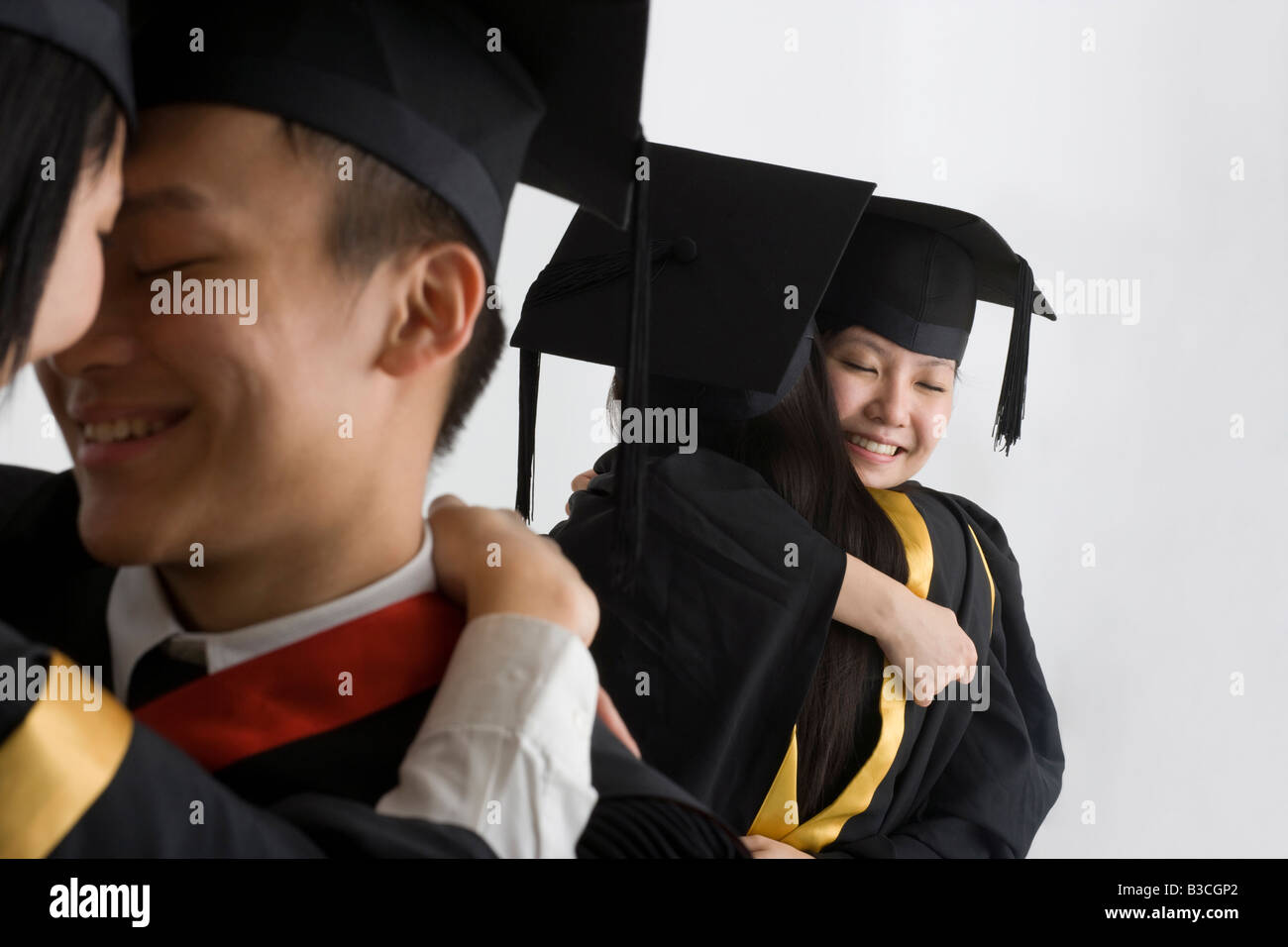 Female graduates hugging hi-res stock photography and images - Alamy