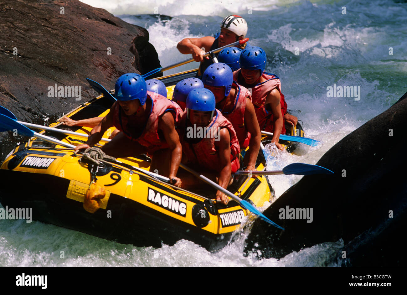 Australia, Queensland. Whitewater rafting on the Tully River near ...